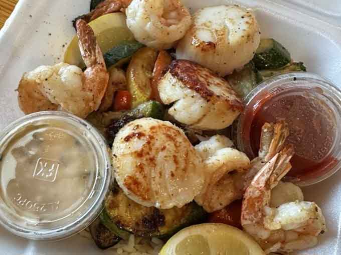 Shrimp and scallops grilled to perfection with vegetables that actually look like they want to be there.