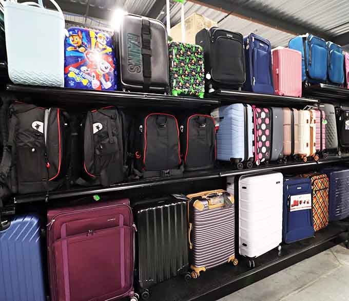 Luggage in every color of the rainbow, ready to accompany adventures without requiring you to take out a travel loan.