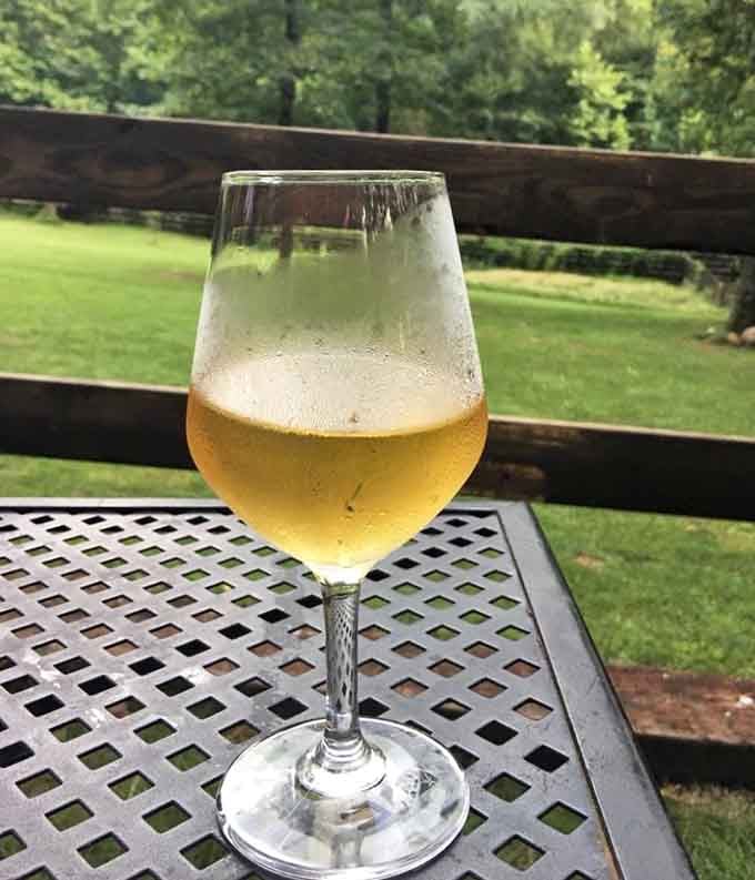 Overlooking green pastures with wine in hand, this is what peaceful afternoons were made for.