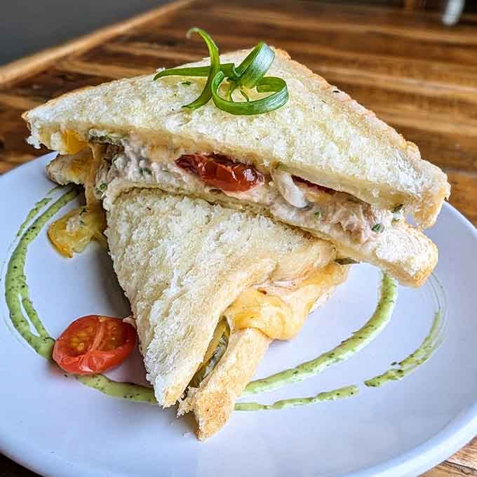 A tuna melt elevated to art form, because sometimes the classics deserve a standing ovation and extra napkins.