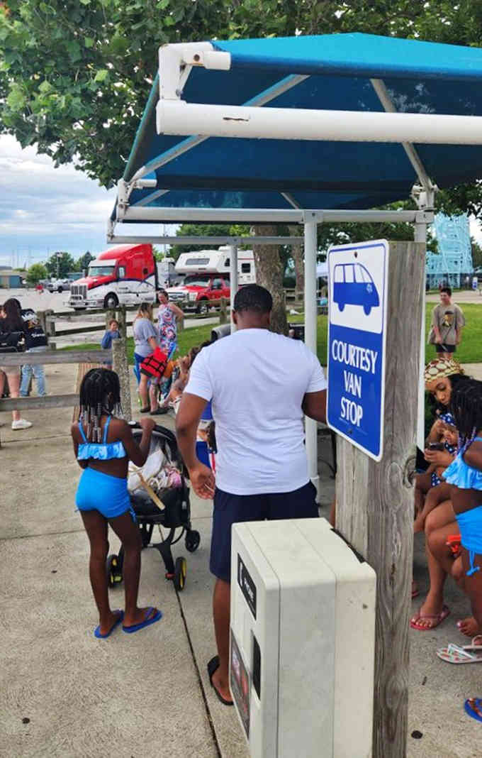 The courtesy van stop where families realize they packed everything except the one thing they actually needed.