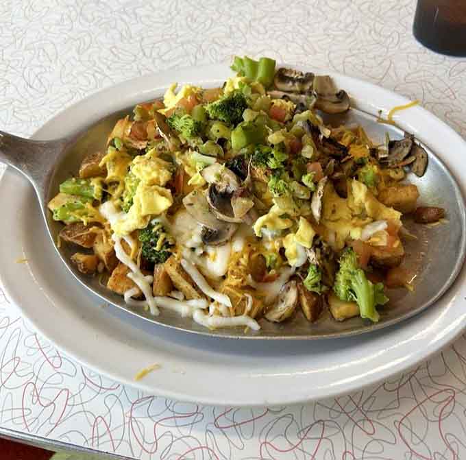 Who says diner food can't include vegetables? This colorful skillet proves comfort and nutrition can coexist beautifully.