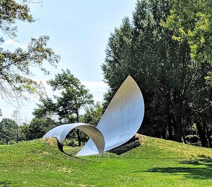 Modern sculpture meets manicured lawn, because even small towns deserve thought-provoking public art installations.