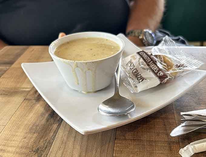 Creamy clam chowder with crunchy oyster crackers at Chowder Heads offers comforting flavors and a warm, satisfying bite.