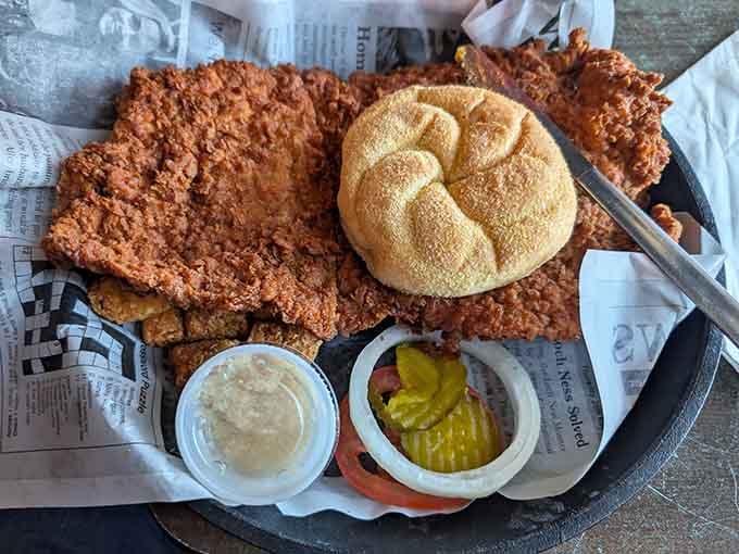 The Kaiser bun looks adorably optimistic trying to contain this golden-brown monster of deliciousness.