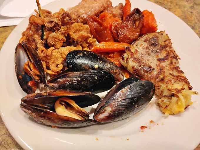 Mussels, shrimp, and pasta together on one plate is the kind of seafood commitment we can all admire.