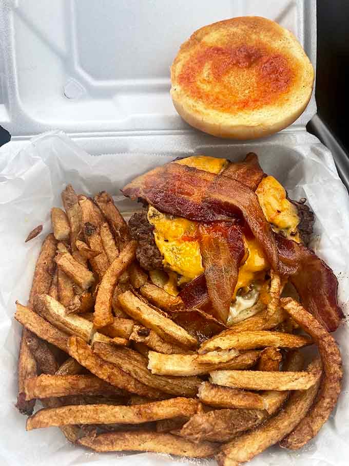 Bacon, cheese, and a perfectly grilled patty create the holy trinity of burger perfection that'll haunt your dreams forever.