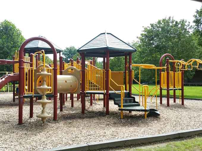 Pitts Park offers playground fun for grandkids and shaded benches for grandparents who've earned their rest.
