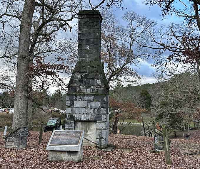 This historic chimney stands as a quiet reminder of the families who lived here before the lake.