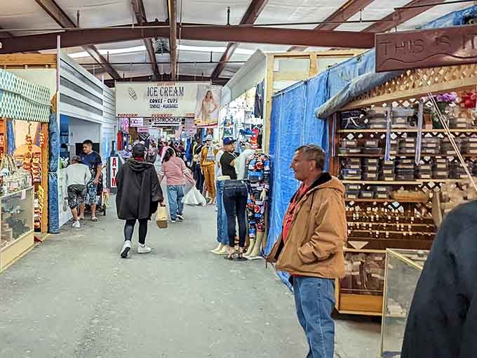 Ice cream signs beckon weary shoppers while crowds navigate aisles stuffed with everything imaginable under one roof.