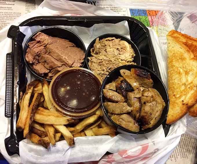 This combo platter doesn't believe in portion control, and frankly, neither should you when barbecue's involved.