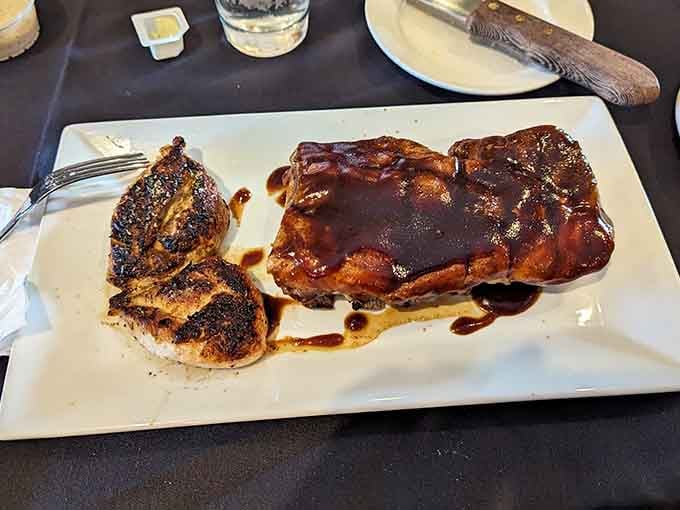 Ribs glazed to mahogany perfection paired with tender chicken creates a plate that demands your full attention.