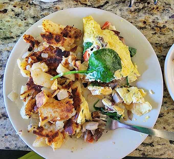 Golden home fries meet a fluffy omelet in a breakfast romance worthy of its own sitcom.