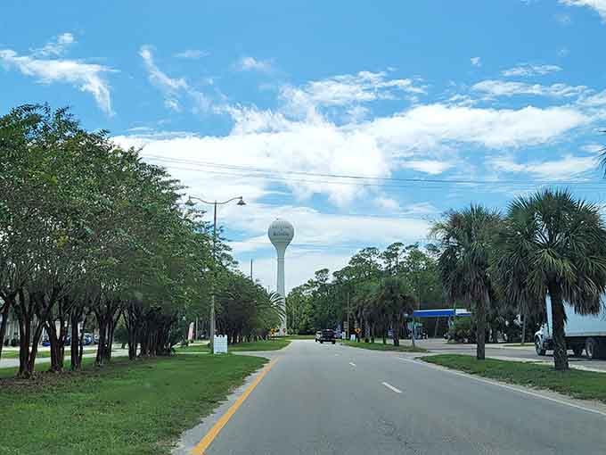That water tower welcomes you to island time, where your biggest worry is sunscreen reapplication.