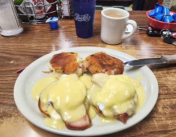 Eggs Benedict with golden hollandaise and crispy hash browns will make your morning absolutely sing.