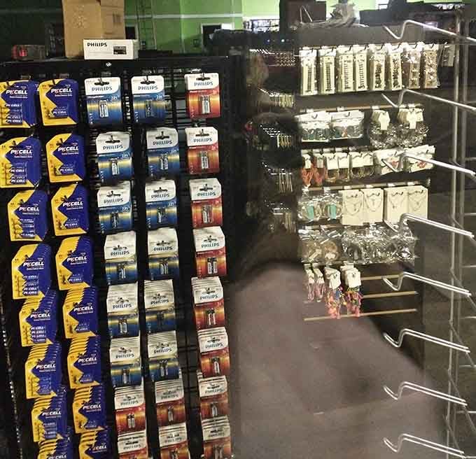 Batteries and light bulbs stacked like treasure, proving the little things in life don't need big prices.