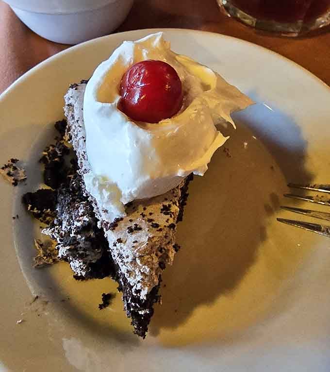 Black forest cake topped with whipped cream and a cherry makes the perfect finale after conquering that legendary ribeye.