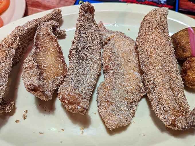 That perfectly seasoned coating on whole catfish is what food dreams are made of &ndash; crispy perfection meets tender fish.