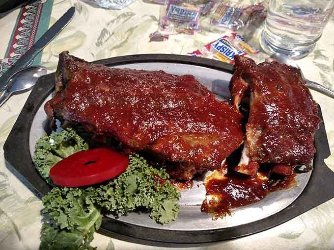These ribs arrive glazed and gorgeous, the kind that make you forget napkins exist until it's too late.