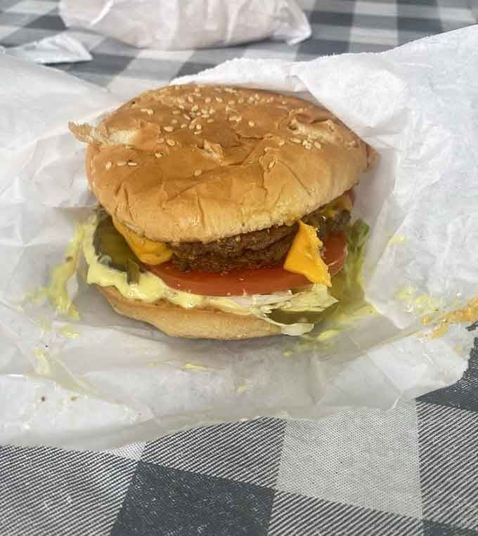 Sesame seed bun, melted cheese, fresh toppings: the Big Tom is burger perfection in edible form.