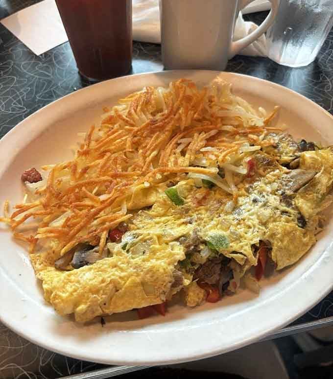 This omelet comes loaded with everything good in life, paired with hash browns achieving crispy perfection.