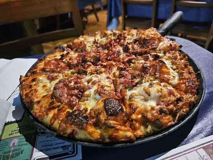 The Wolf Man pizza arrives loaded with enough meat to satisfy your inner carnivore's wildest dreams.