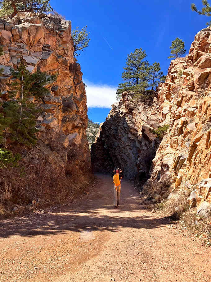 Walking between these towering rock formations feels like strolling through nature's own cathedral, minus the uncomfortable pews.