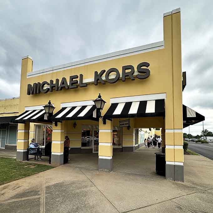 Michael Kors luxury awaits behind those classic awnings, proving designer style doesn't require designer budgets.