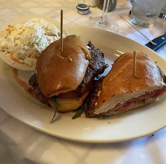 This steak sandwich towers with ambition, proving lunch can be just as spectacular as any dinner service.