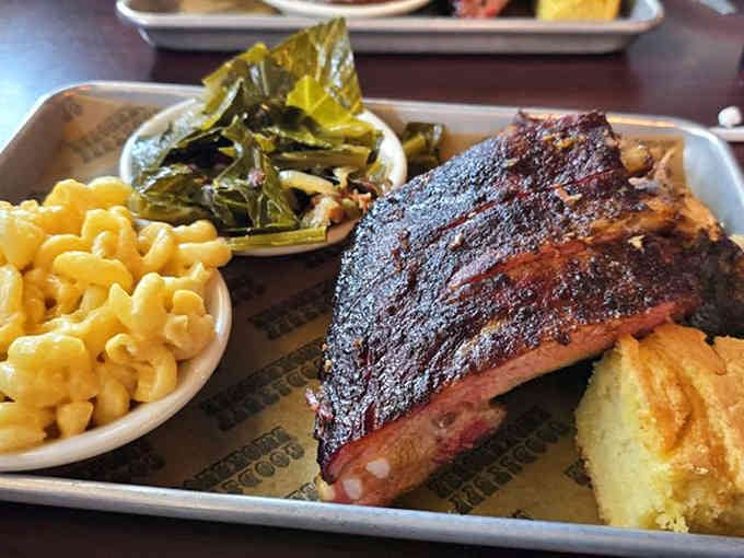 Half rack of perfection paired with collard greens and sweet potato tots, because balance matters in life.