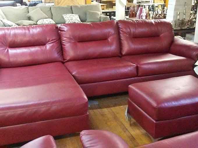 That burgundy leather sectional looks ready for serious relaxation without the furniture store sticker shock.
