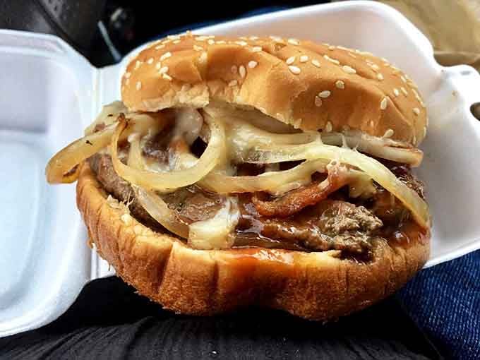 Grilled onions cascade over the Longhorn like a savory waterfall you'll want to dive into headfirst.