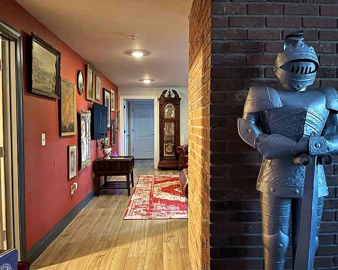 A suit of armor stands watch in the hallway, because every proper wizarding home needs medieval security.