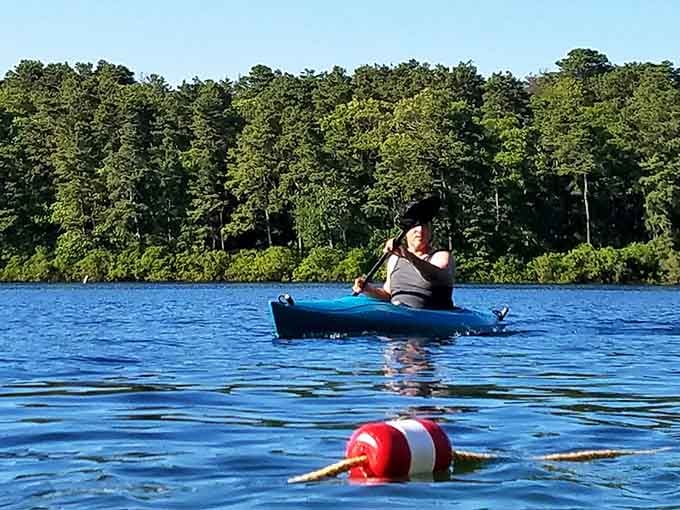Kayaking across glass-smooth water beats any gym membership you've been avoiding since January.