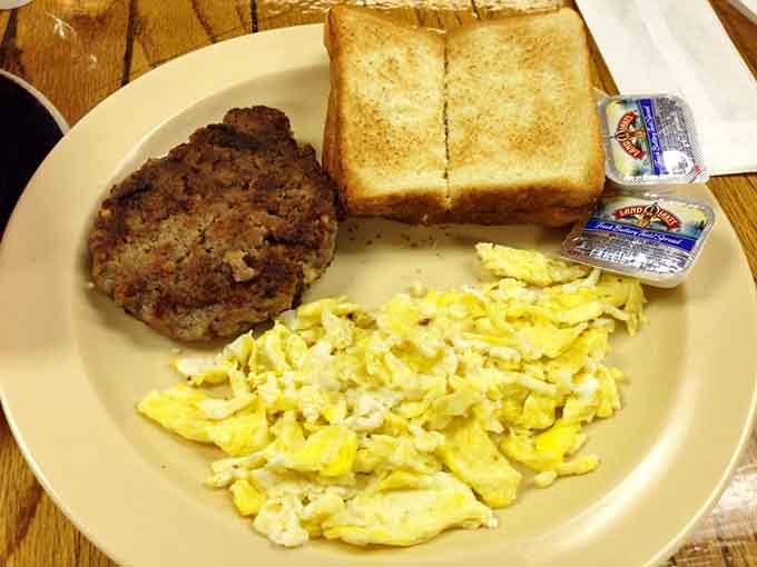 Perfectly cooked eggs and sausage with toast prove that simple done right beats complicated done wrong every single time.