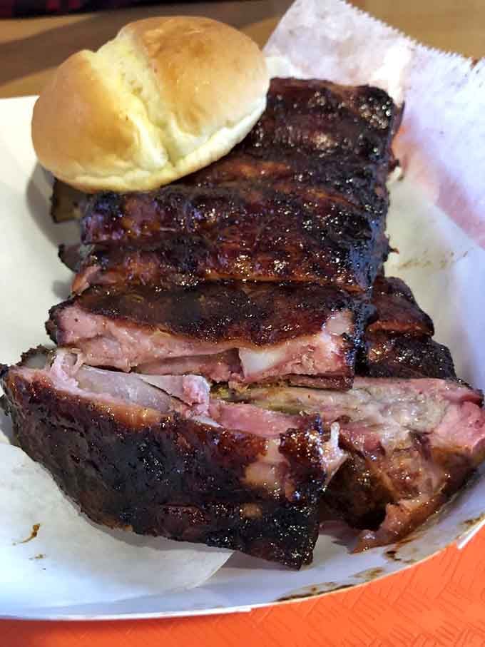 These ribs have the perfect bark and that beautiful smoke ring that makes pitmasters weep with joy.