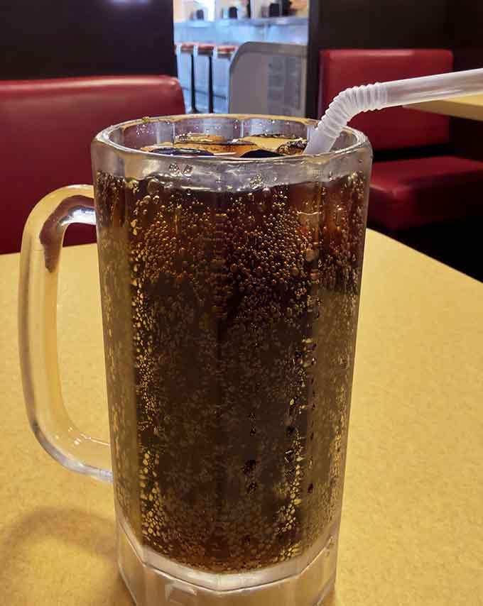 Sometimes the simplest pleasures are the best: fizzy cola in a frosty mug on a warm afternoon.