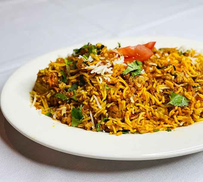 Golden biryani rice so fragrant and perfectly spiced, you'll want to Instagram it before your dining companions steal a bite.