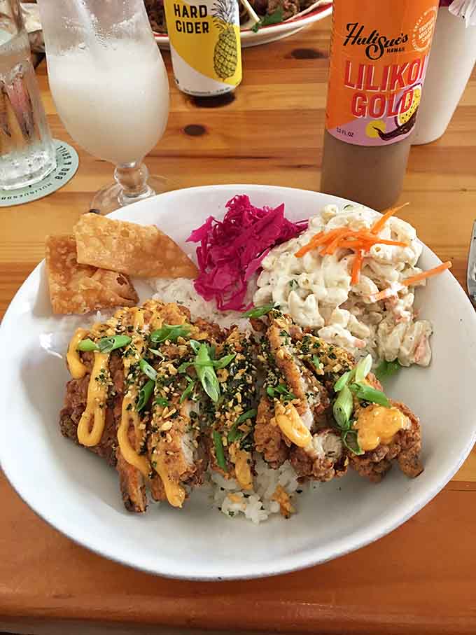 Mochiko chicken over rice with all the fixings, because sometimes fusion food just makes perfect sense.