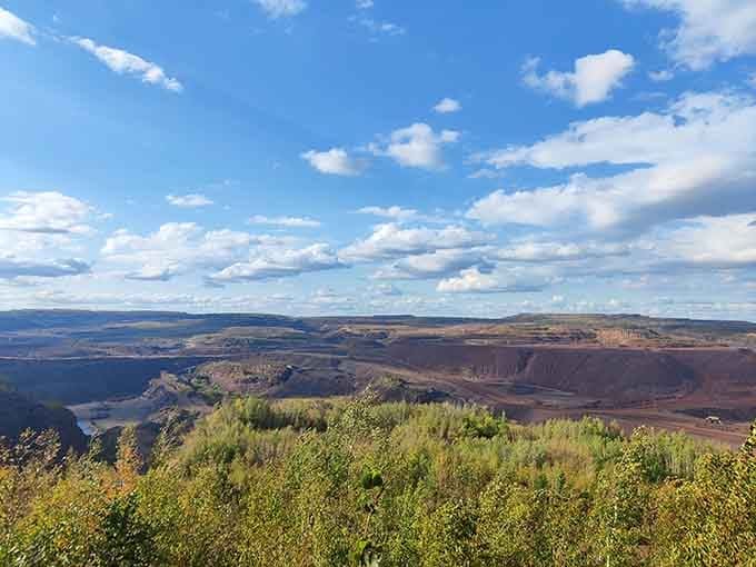 Autumn colors meet industrial might, proving that nature and human ambition can create something unexpectedly beautiful together.