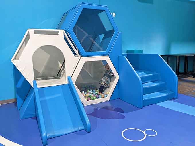 Hexagonal hideaways that make kids feel like they've discovered secret underwater caves with ball pit treasure.