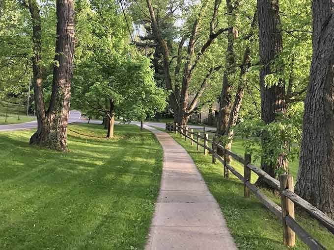 Tree-lined paths wind through neighborhoods where walking is still the preferred mode of transportation, imagine that.