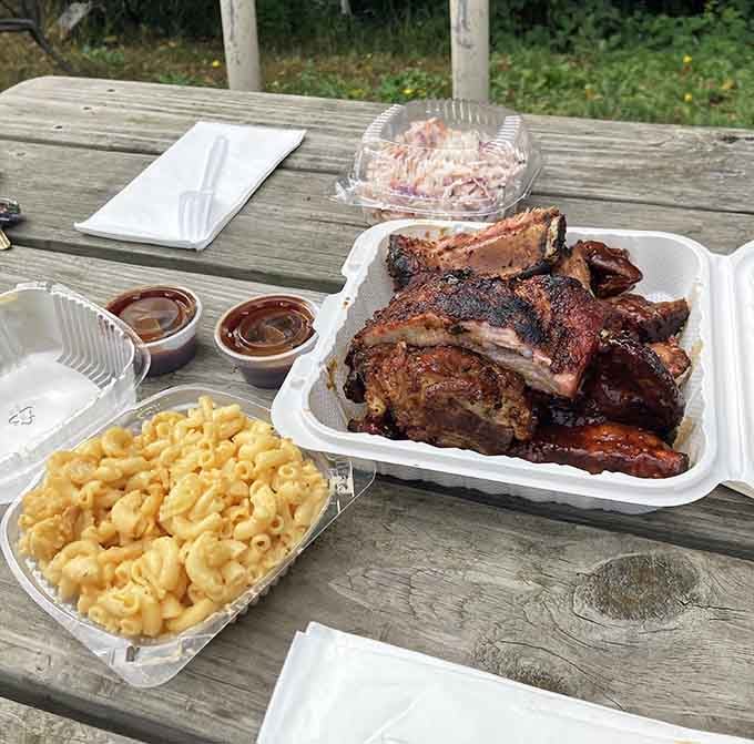A feast fit for royalty: ribs, creamy mac and cheese, fresh coleslaw, and enough napkins for the inevitable mess.