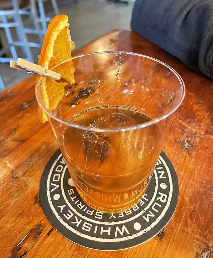 That dehydrated orange slice isn't just pretty, it's a flavor bomb waiting to enhance your sipping experience.