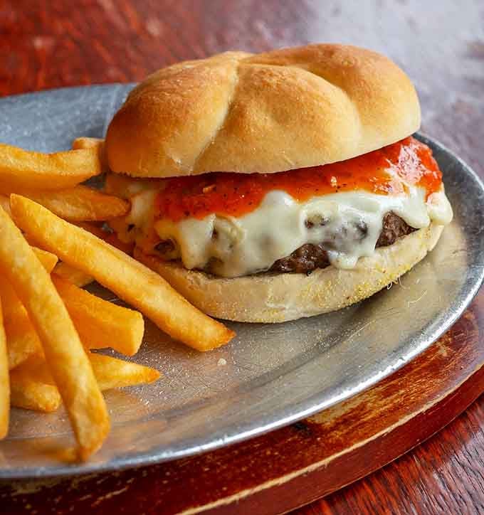 When a burger wears marinara and melted cheese this confidently, you know it's earned the right to show off.