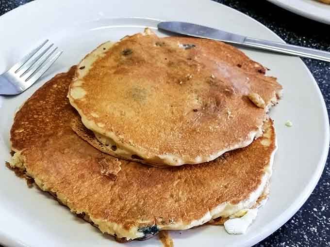 Pancakes so perfectly golden they could be in a Norman Rockwell painting. Oh wait, this place is.