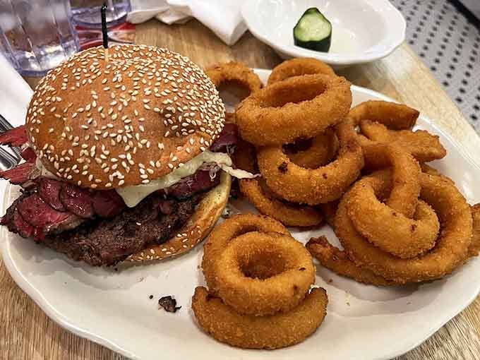 When your burger needs onion rings as backup dancers, you know it's taking center stage seriously.