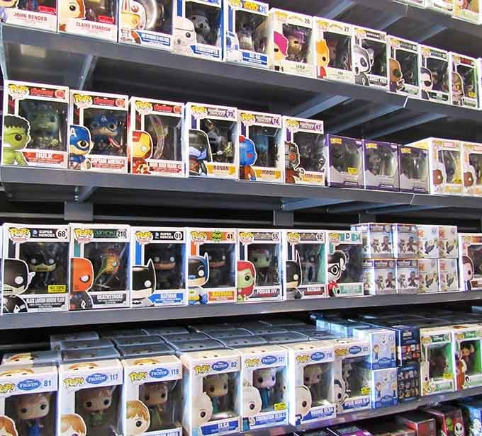 Funko Pop figures lined up like tiny celebrities waiting for their close-up, ready to join your collection at outlet prices.