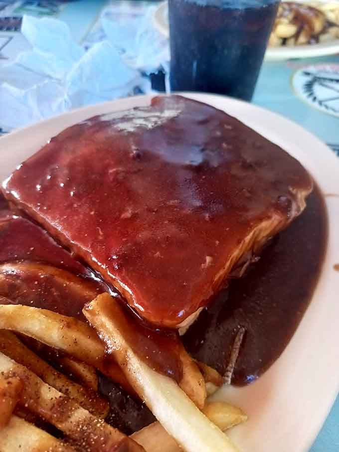 Roast beef swimming in gravy alongside golden fries is the definition of a meal that means business.