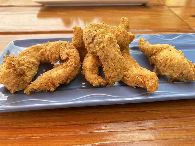 Golden cornmeal-crusted catfish fingers that would make any Southern grandmother nod in approval and ask for seconds.